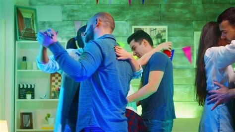Young Beautiful Couples Dancing On Romantic Music At The Party Neon