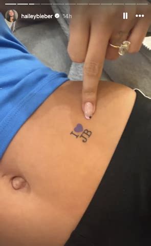 Hailey Bieber Shows Off Cheeky Temporary Tattoo To Support Justin At