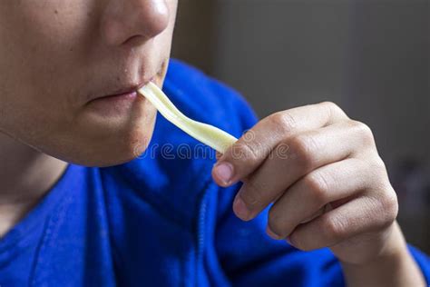 Boy Eats Homemade Noodles With His Long Hands Sucking His Lips Stock Photo Image Of Food