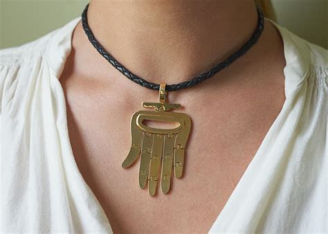 1972 Aldo Cipullo Gold Articulated Hamsa Pendant At 1stdibs Anna Cipullo Age Aldo Cipullo