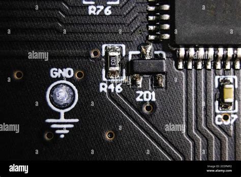 artistic close up for ground test point next to microcontroller