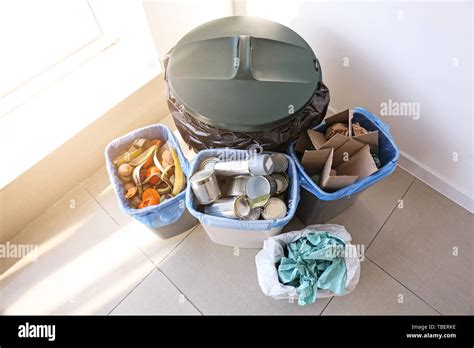Trash Bins With Different Types Of Garbage Indoors Stock Photo Alamy
