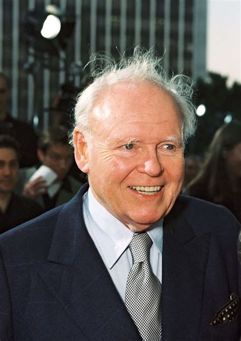 Download Legendary Actor Carroll Oconnor In A Serene Pose Wallpaper