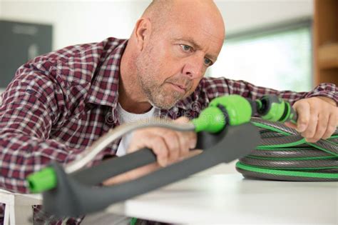 Man Assembling Irrigation Pipe Stock Image Image Of Installing Backyard 311604455