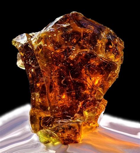 Explore Uv Reactive Amber A Good Luck Charm For Balancing The Sacral Chakra Amber Image