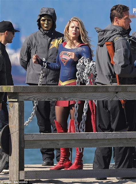 Melissa Benoist As Supergirl Struggles In Chains Surrounded By Armed