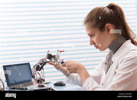 Girl Solder And Adjust Electronic Device Stock Photo Alamy