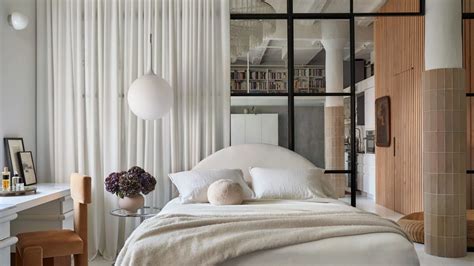 Dumbo Loft By Crystal Sinclair Designs Features A Book Filled Mezzanine