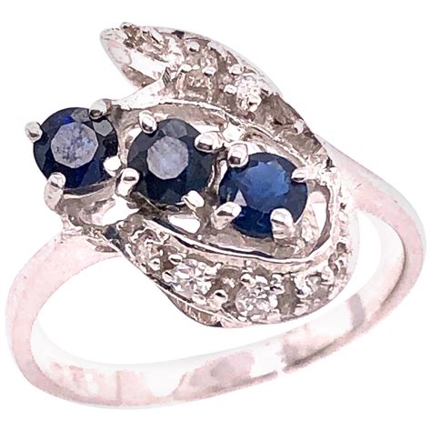14 Karat Yellow And White Gold Blue Sapphire And Diamond Contemporary Ring For Sale At 1stdibs
