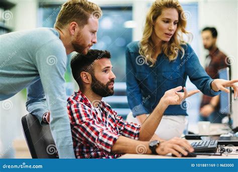 Software Engineers Working On Project And Programming In Company Stock