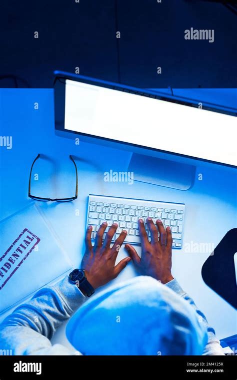 Getting Ready For Cyber Warfare High Angle Shot Of A Young Male Hacker