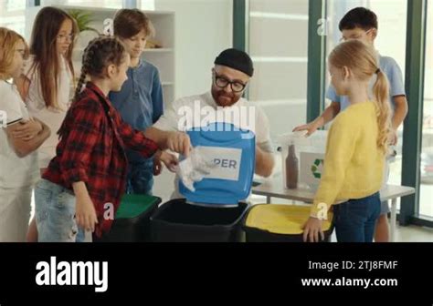 Male Teacher Teach Where To Sort The Rubbish Garbage Sorting Class Teacher Tells And Asking