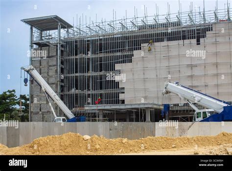 A Multi Story Building Under Construction With Exposed Steel Framing