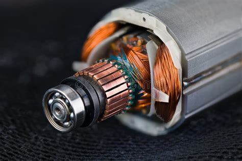 Rotor And Stator Detail Of Electric DC Motor On Black Mesh Background Stock Photo Image Of
