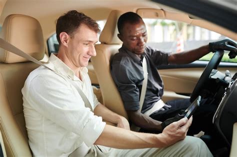 Premium Photo Passenger Giving Tips To Driver