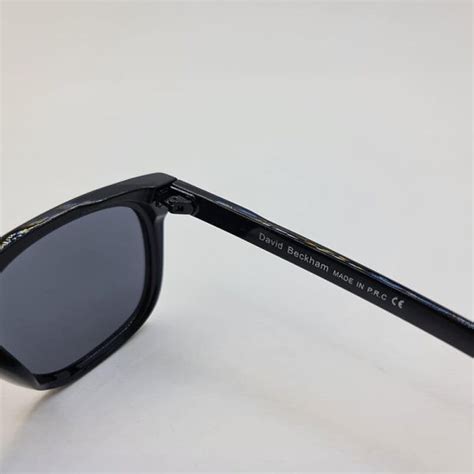 قیمت و خرید عینک آفتابی دیوید بکهام مدل D22842 Barag Trand