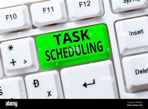 Text Sign Showing Task Scheduling Internet Concept The Assignment Of Start And End Times To A