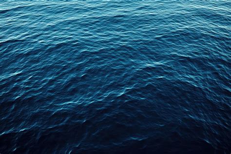 Deep Blue Ocean Waves Creating A Tranquil Atmosphere At Sunset 70580964