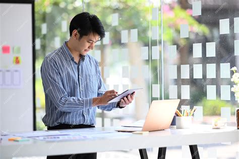 Premium Photo Asian Male Professionals Web Developer Working On Software Development And Using