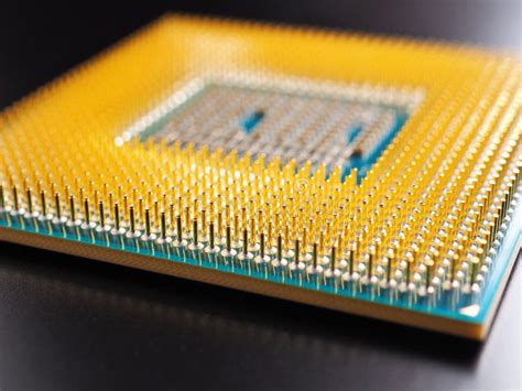 Processor Microprocessor Of A Computer Or Laptop Lies On A Dark Matte Surface Close Up Stock