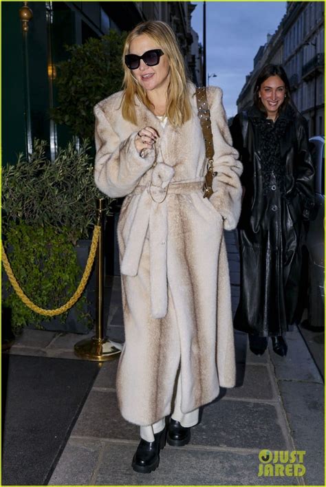 Kate Hudson Stuns In A Tight Fitting Sheer Dress And A Luxurious Faux Fur