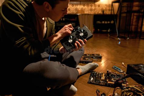 Man Assembling Graphics Card Of Pc For Mining Stock Image Image Of