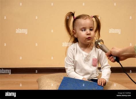Cute Girl Giving Interview Stock Photo Alamy