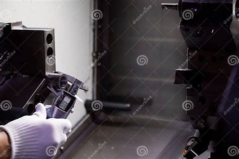 Cnc Lathe Operator Turning Workpiece In Chuckproduction Of Electric