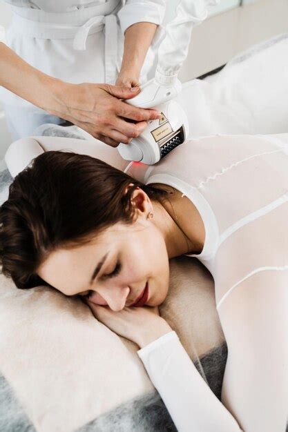 Premium Photo Massaging Congested Areas Of Upper Body With Lymphatic
