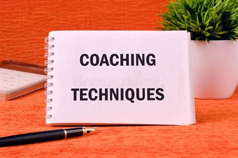 Concept Of Business And Development Conceptual Text Coaching Techniques Written On A Clean