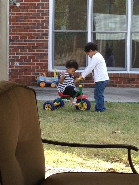 Big Brother Teaching His Sister To Ride