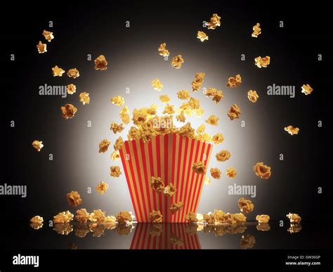 Popcorn Exploding From Bucket Stock Photo Alamy