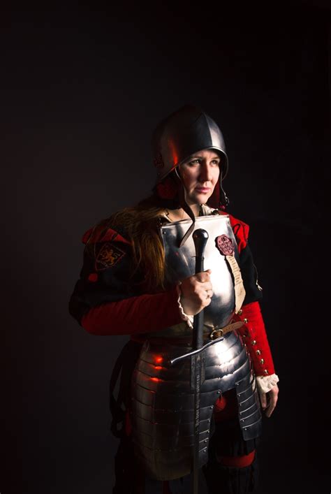 A Young Woman Dressed As An Empire Swordswoman From Warhammer Fantasy