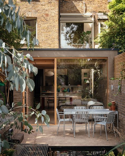 Nimtim Architects Creates London Home Extension With Walled Garden