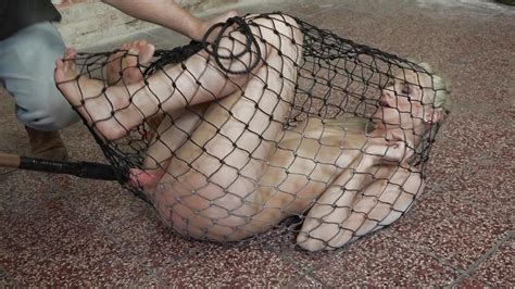 Rebecca Black Is Fucked With A Dildo Through A Net Enclosure Video