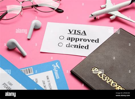 Composition With Passport Toy Plane And Tickets On Pink Background