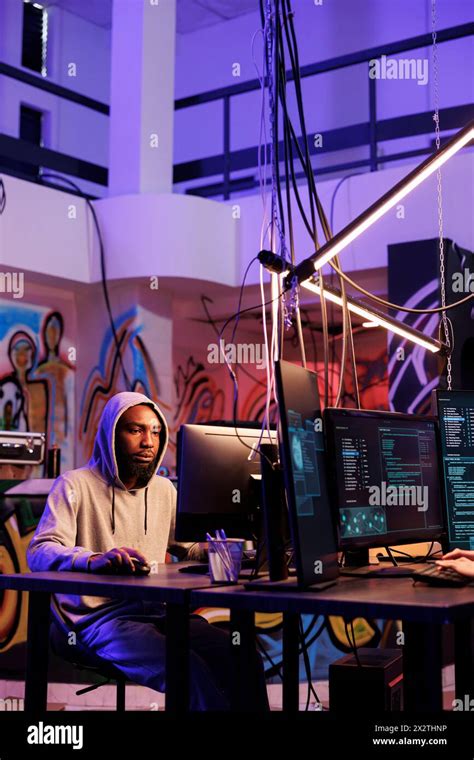 African American Criminal Hacking Into Server And Cracking Password On Computer Hacker