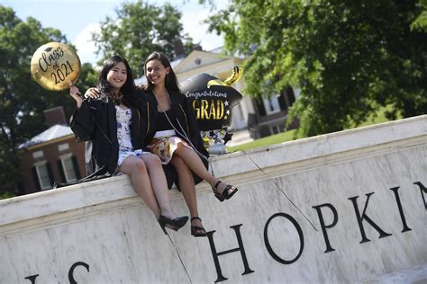 Download Johns Hopkins University Happy Graduates Wallpaper