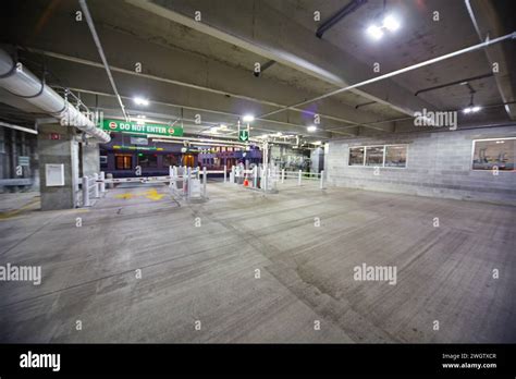 Modern Parking Garage Exit With Yellow Arrows And Illuminated Signs Wide Angle Stock Photo Alamy