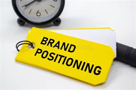 Branding Positioning Text In Bold Black Font On Yellow Sticky Note