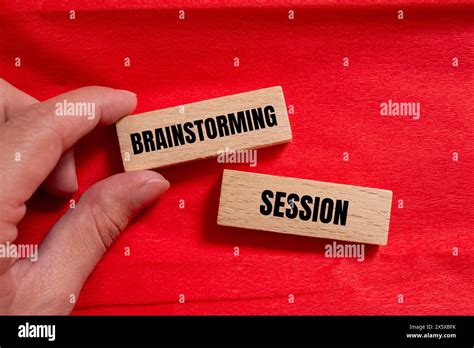 Brainstorming Session Words Written On Wooden Blocks With Red Background Conceptual