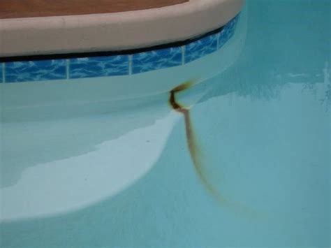 Rust Stains In Your Pool Remove Them Without Draining Your Pool Water