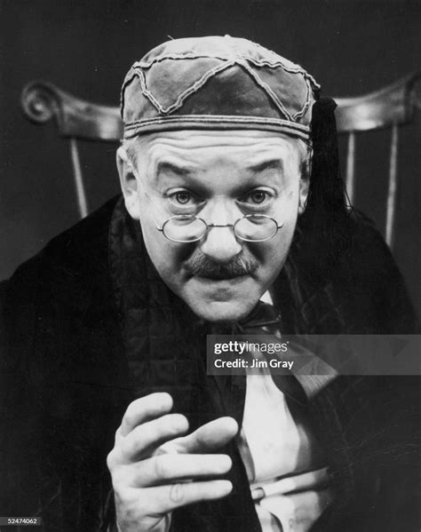 British Actor David Kossoff Wears A Jewish Cap And Smoking Jacket