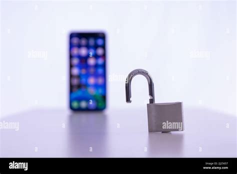 Privacy And Data Protection Smartphone With Unlocked Padlock Stock