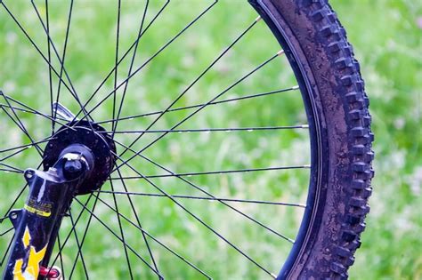 Premium Photo Wheel Bicycle Against Green Grass