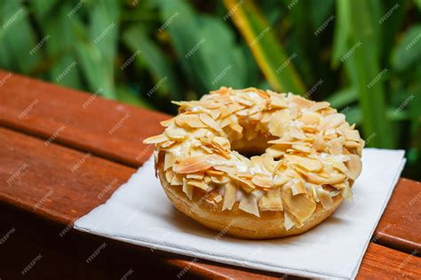 Premium Photo Assorted Colorful Donuts With Assorted Toppings Of Chocolate Nuts Almonds Premium Photo Assorted Colorful Donuts With Assorted Toppings Of Chocolate Nuts Almonds