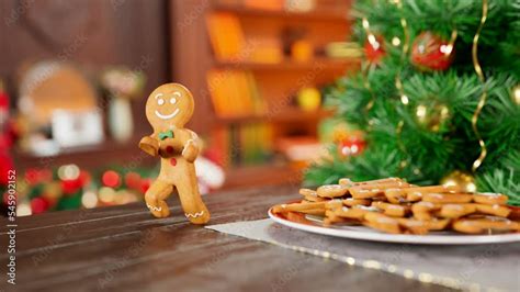 Gingerbread Man Dancing In Christmas Cozy Interior On Table 3d