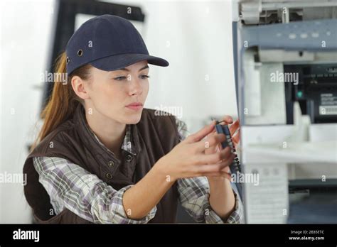 She Is Fixing The Printer Stock Photo Alamy