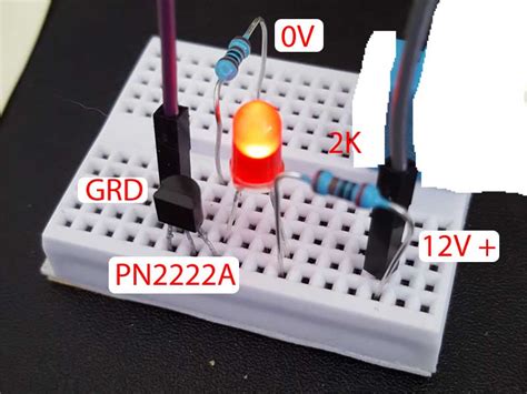 Why Does This Transistor Circuit Light The LED Electrical Engineering Stack Exchange