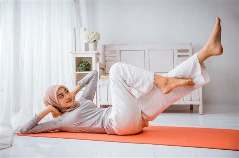 Muslim Woman Instructor Wearing Hijab Doing Yoga Pilates Pose On